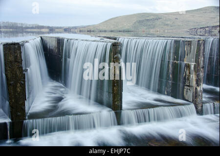 Hydroelectric waterfall dam flowing water Stock Photo - Alamy