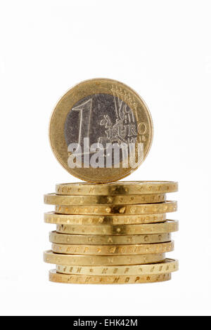 Heap of two euro coins isolated on white background Stock Photo - Alamy