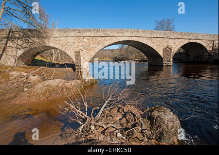 The three arch span Logie Bridge over the River Findhorn opened in 1817 ...