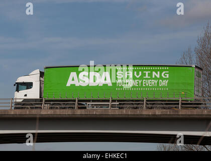 Asda supermarket delivery lorry and trailer overtaking a similar ...