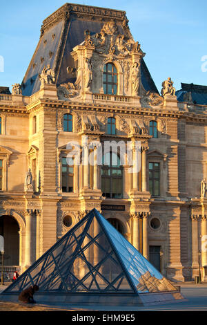The Louvre Palace and Pyramid before sunset, Paris, France Stock Photo ...