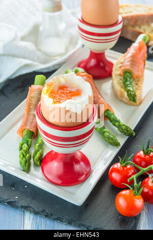 White asparagus with smoked salmon and egg sauce FoodCollection Stock ...