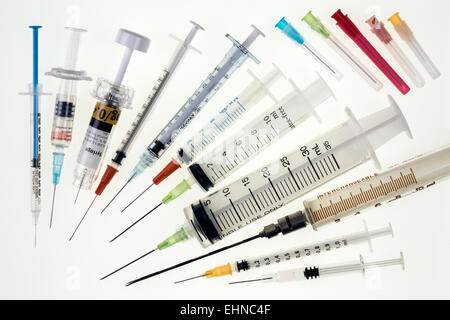 A selection of syringes and hypodermic needles used in medicine to give ...