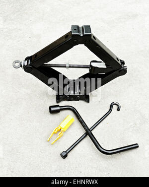 Car hand lifter set for tire changing Stock Photo - Alamy