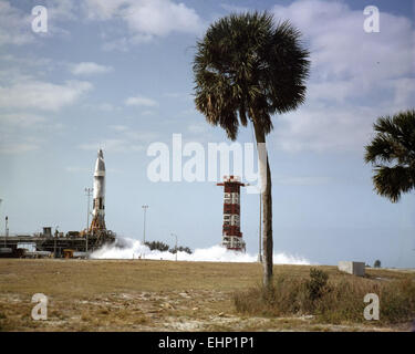 This photograph shows an Atlas 10A missile on its launch pad with the ...