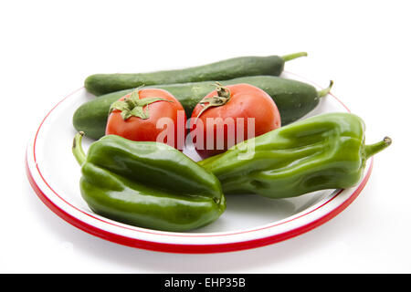 Cucumbers with paprika and tomatoes Stock Photo - Alamy
