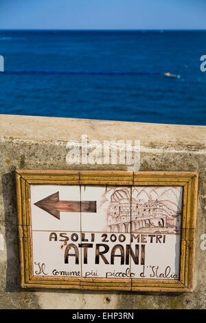 A sign pointing in the direction of the Coast Path in Weymouth town ...