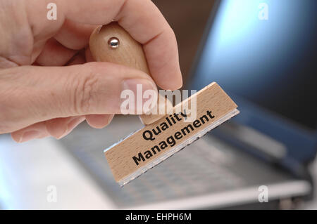 quality management marked on rubber stamp Stock Photo - Alamy