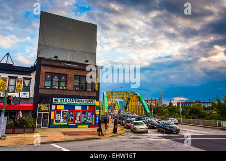 Shops and traffic on the Howard Street Bridge in Baltimore, Maryland ...