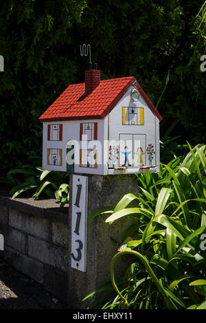 Mailbox in the shape of a house Stock Photo - Alamy