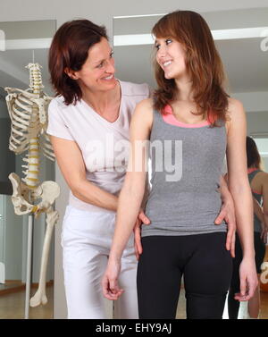 Two women therapist and patient having facial massage session at beauty ...