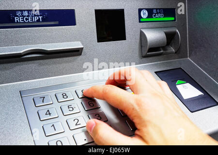 ATM - entering pin close up Stock Photo - Alamy