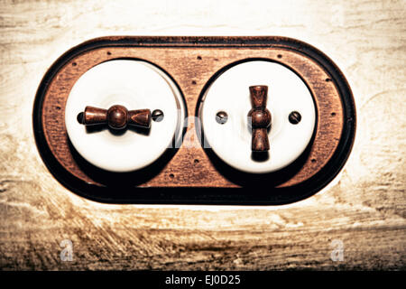 Ancient style double light switch made of porcelain and wood Stock ...