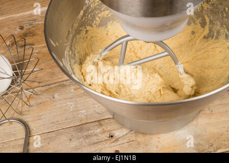 Food processor with beater tool preparing dough for a cake Stock Photo ...