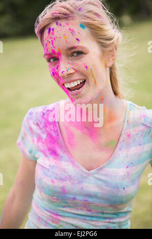 Young woman having fun with powder paint Stock Photo - Alamy