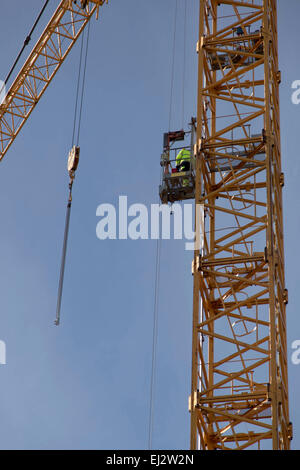 Construction elevator on the clear sky background Stock Photo - Alamy