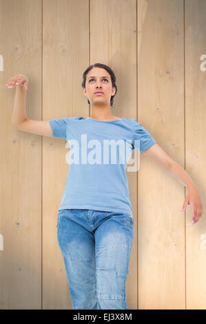 Composite image of powerless brunette Stock Photo - Alamy