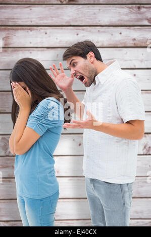Image of frustrated and angry man in white sweater, shouting in rage ...