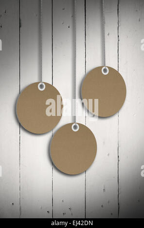 Composite image of circle tag hanging Stock Photo - Alamy