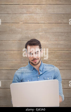 Handsome man using laptop Stock Photo - Alamy