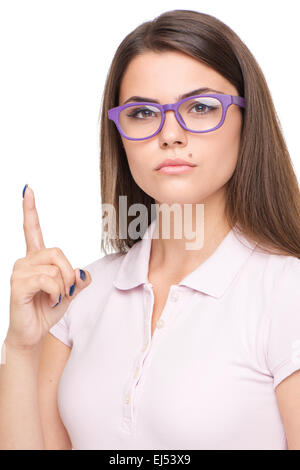 Young businesswoman with finger point up Stock Photo - Alamy