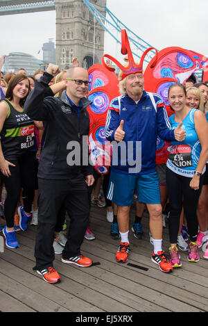 Sir Richard Branson and Hugh Brasher along with charity runners who ...