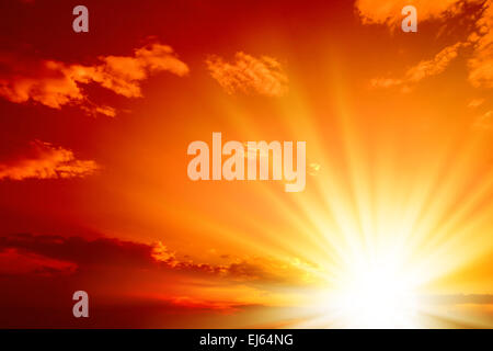 Red sunset, rich dark clouds, rays of light Stock Photo - Alamy