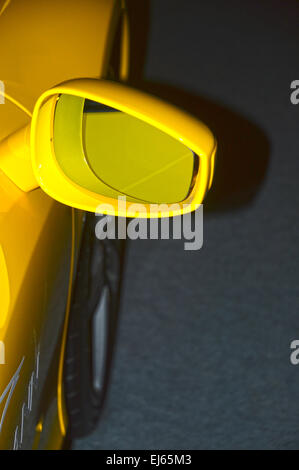 Luxury yellow sports car mirror, close up photo Stock Photo - Alamy