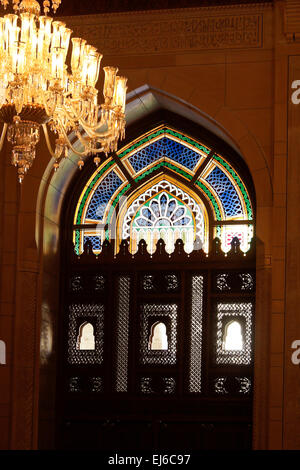 Stained glass window and crystal chandelier, Sultan Qaboos Grand Mosque ...
