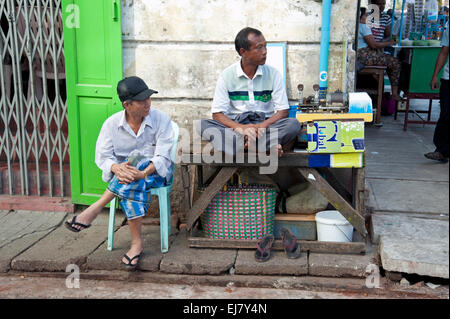 Two Men in the Streets of Rangoon, Myanmar Stock Photo - Alamy