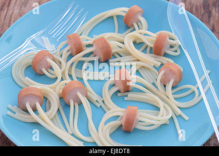 Wiener and spaghetti funny snack for kids Stock Photo - Alamy