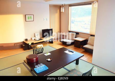 Traditional Japanese style hotel room with tatami mats and futon bed ...