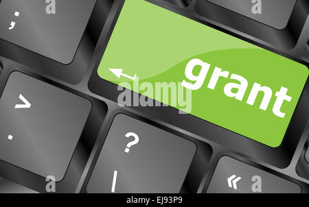 Computer keyboard button with grant button Stock Photo - Alamy