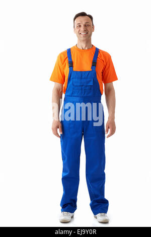 Man in working overalls isolated profile view Stock Photo - Alamy