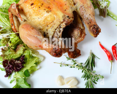 The baked hen with salad Stock Photo - Alamy