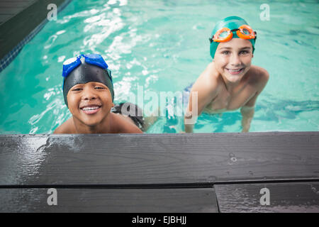 Little boys smiling in the pool Stock Photo - Alamy