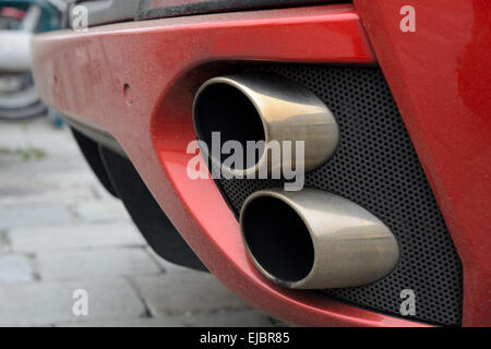 Close up of a car dual exhaust pipe. Double exhaust pipes of a modern ...