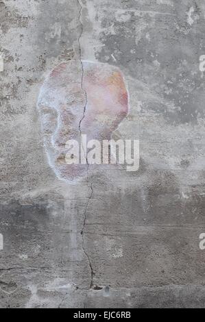 Crumbling wall plaster sprayed with graffiti Stock Photo - Alamy