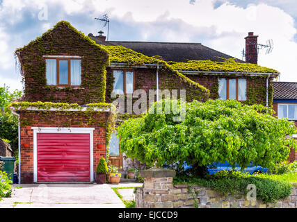 English house with garage, uk Stock Photo - Alamy