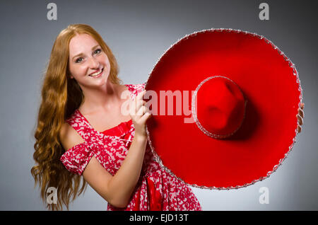 Mexican woman wearing red sombrero Stock Photo - Alamy