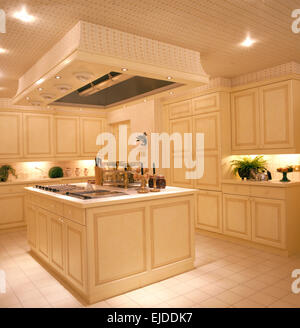 Extractor above hob in island unit in large modern Spanish apartment ...