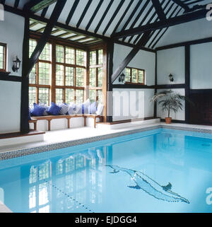 Indoor swimming pool in barn conversion with beautiful timbers Stock ...