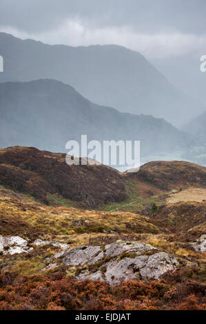 Dramatic rainy weather in Snowdonia. Rain falling on hills and ...