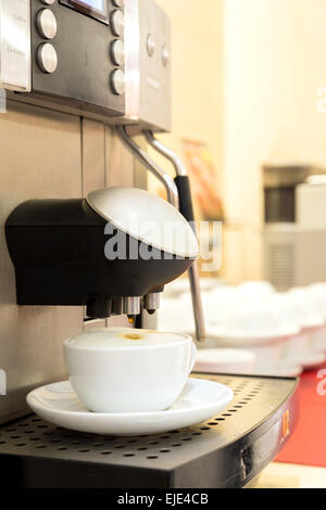 Hot Latte form Coffee machine Stock Photo - Alamy