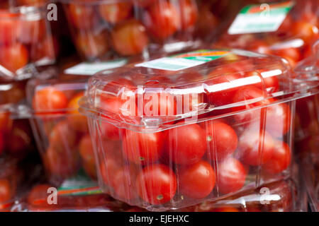 Red tomatoes on plastic box Stock Photo - Alamy