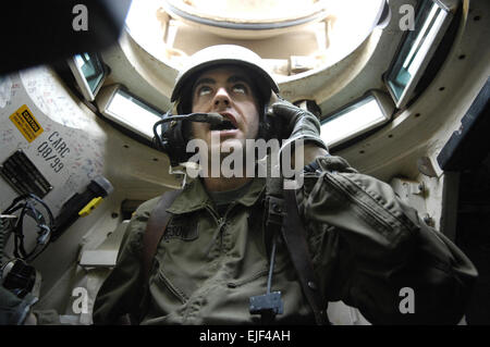 M1A2 Abrams Tank Gunner Sgt. Matthew Tolan of Heavy Company, 3rd ...