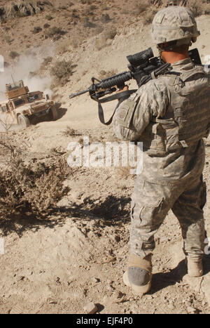 A U.S. Army Staff Sergeant with the 4th Infantry Division's G6 signal ...