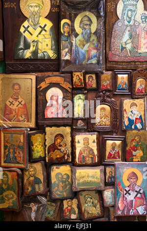 Display of Greek souvenirs religious icons on rack in downtown shopping ...