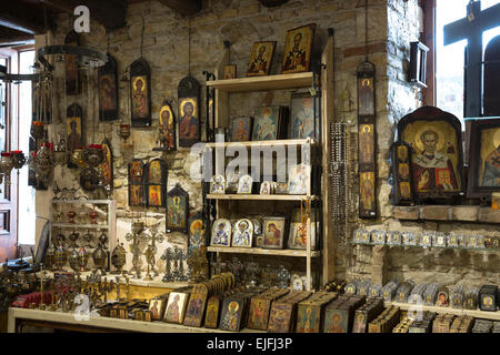 Display of Greek souvenirs religious icons on rack in downtown shopping ...