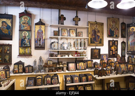 Display of Greek souvenirs religious icons on rack in downtown shopping ...